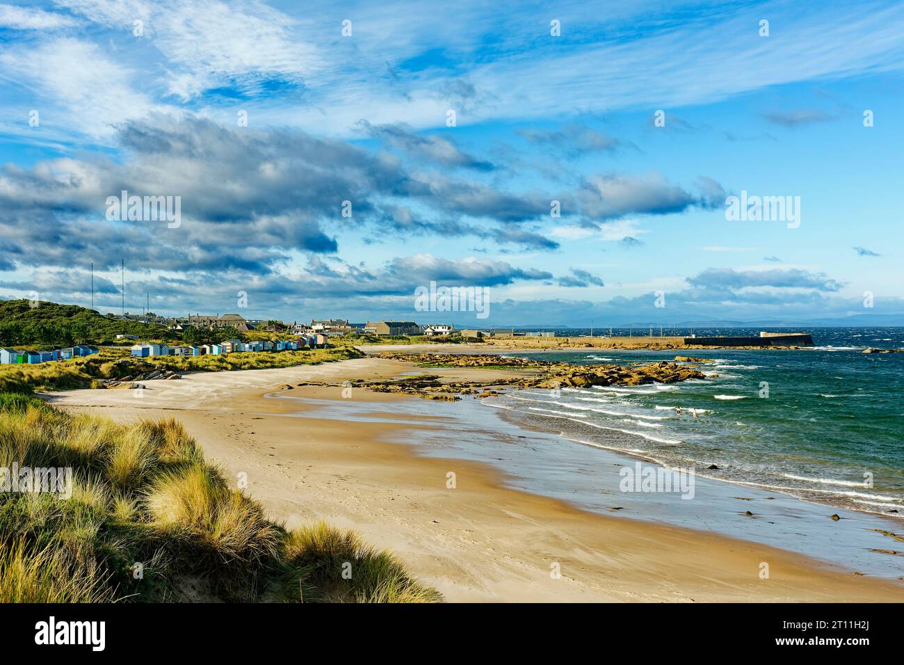 Hopeman Moray Coast Scotland East Beach wind blown sand and bathers in ...