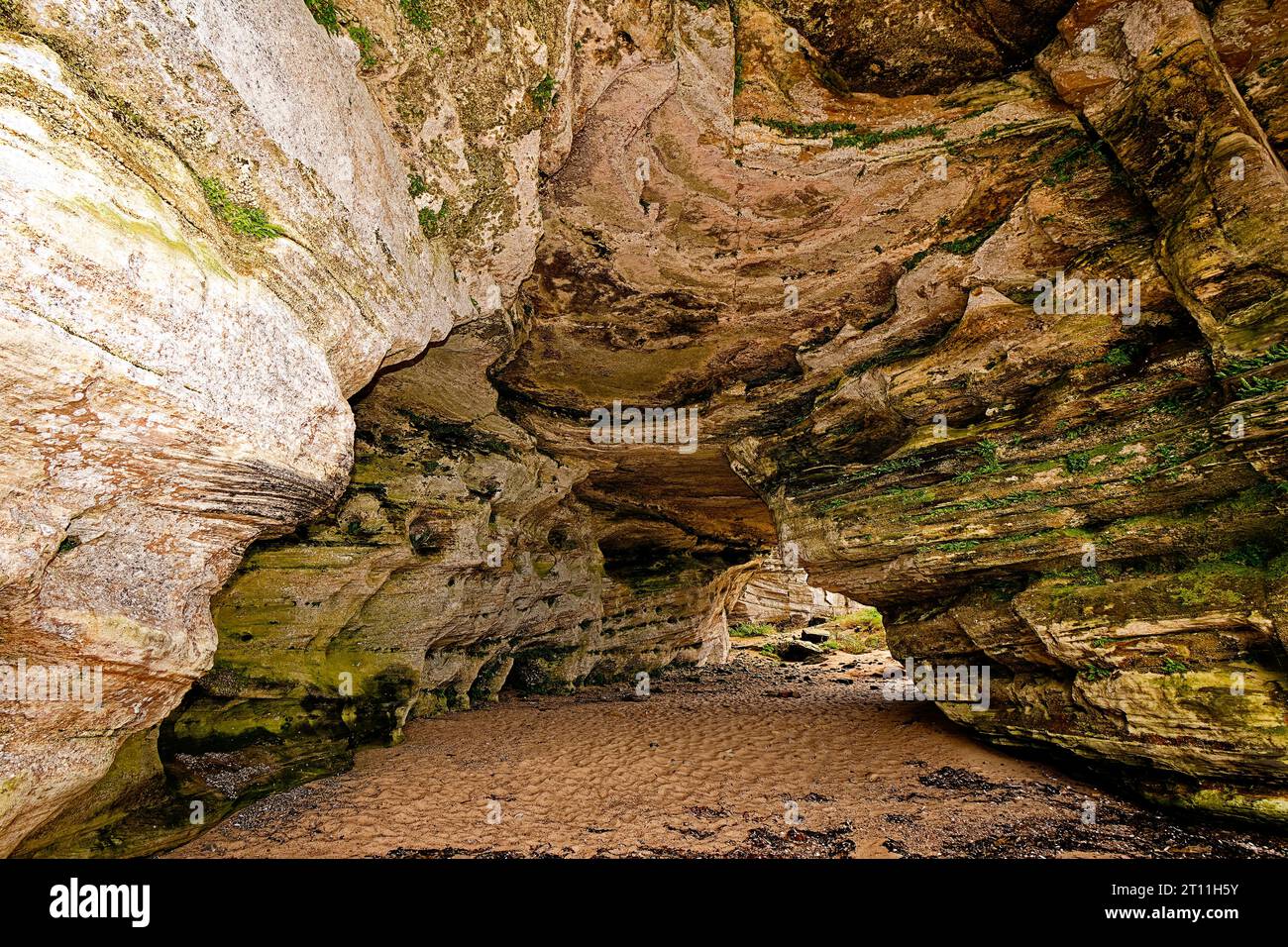 Hopeman Moray Coast Scotland entrance and exit from a cave in the ...