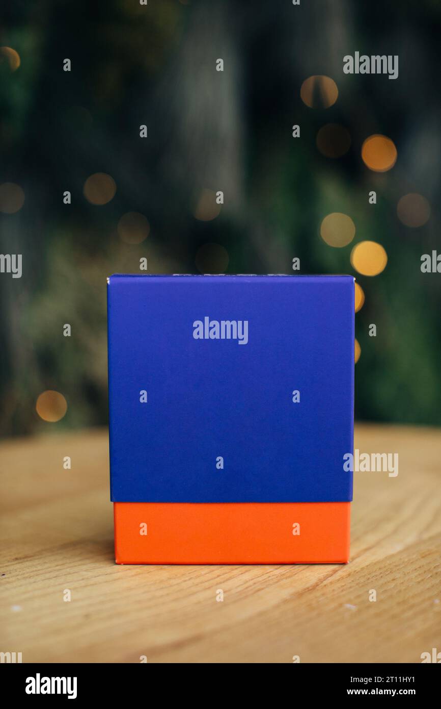 Color boxes - mockups on a Christmas background Stock Photo - Alamy