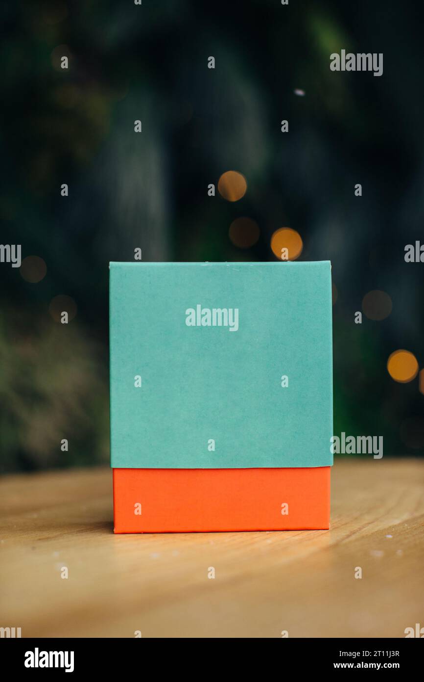 Color boxes - mockups on a Christmas background Stock Photo - Alamy