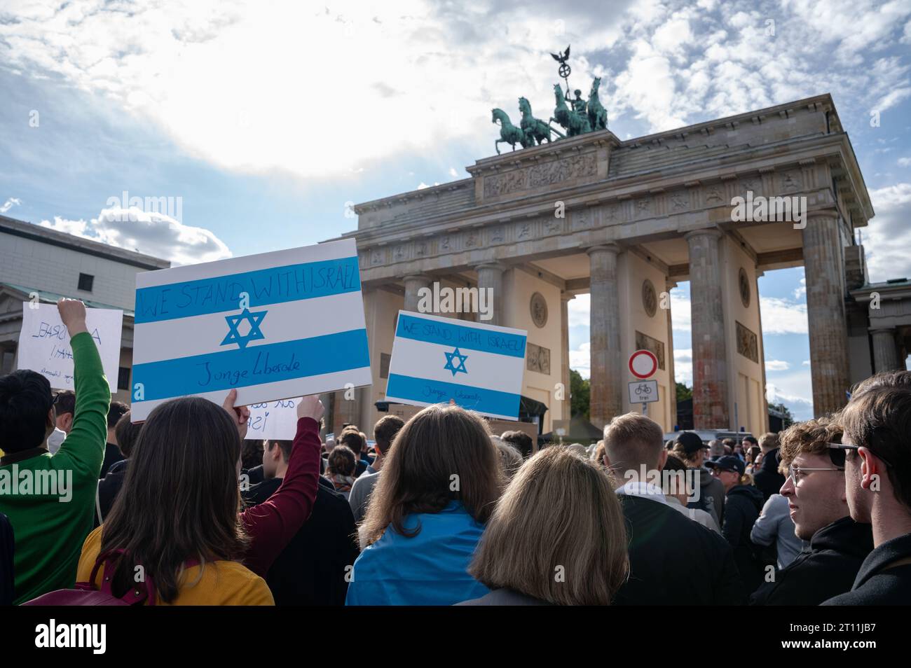 08.10.2023, Berlin, Germany, Europe - Demonstrators hold protest signs ...