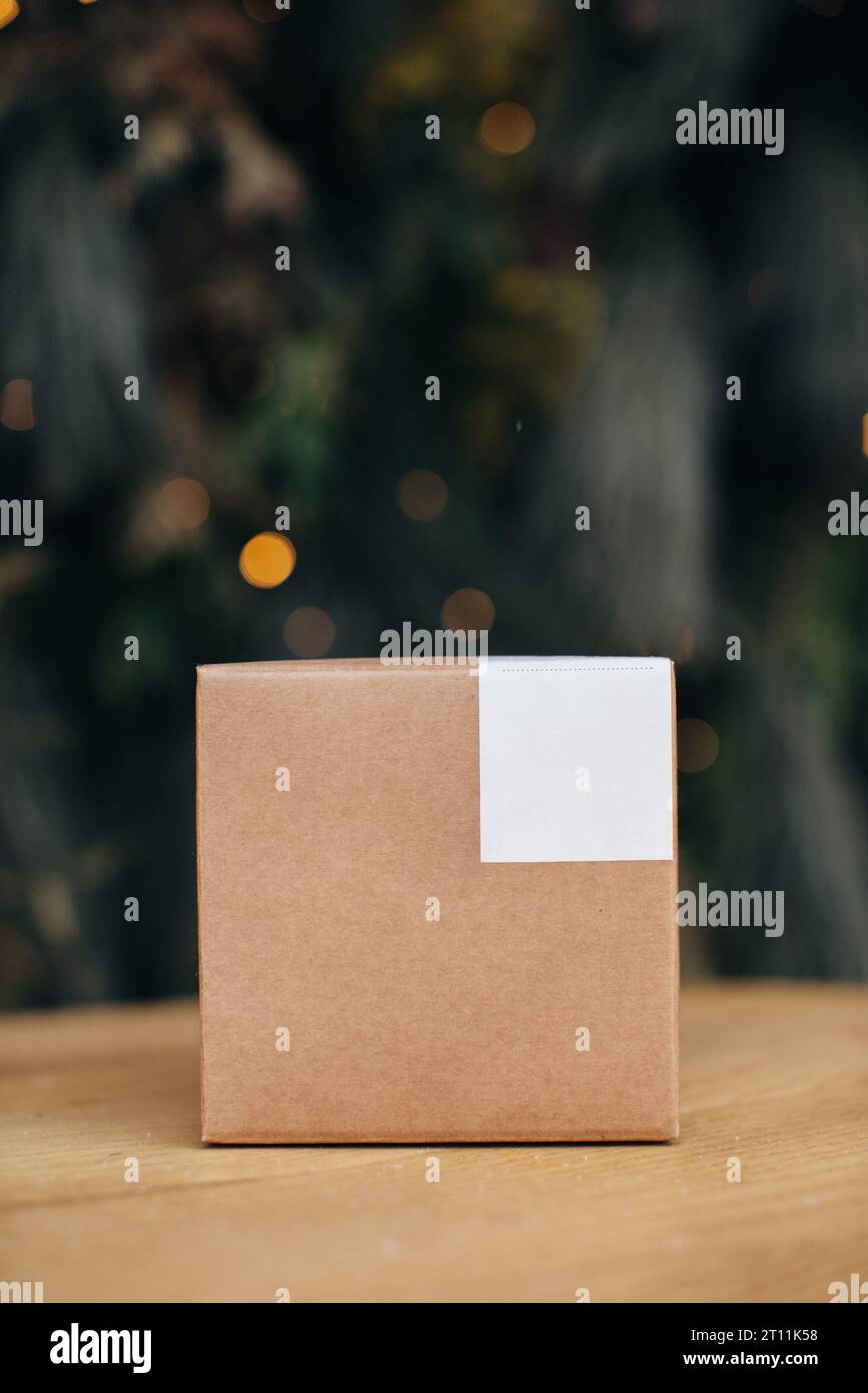 Mockup. Kraft paper boxes with white stickers on Christmas background ...