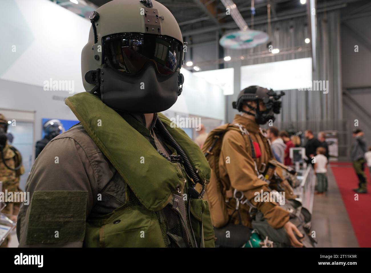 Tactical military helmet with dark visor and jacket on a mannequin at ...