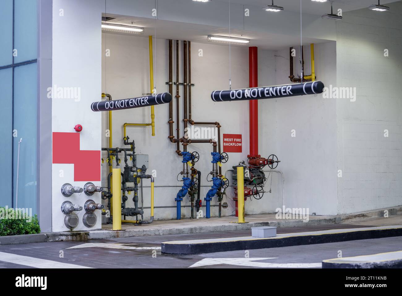 Industrial water fire backflow valves and gas meter at a highrise tower ...