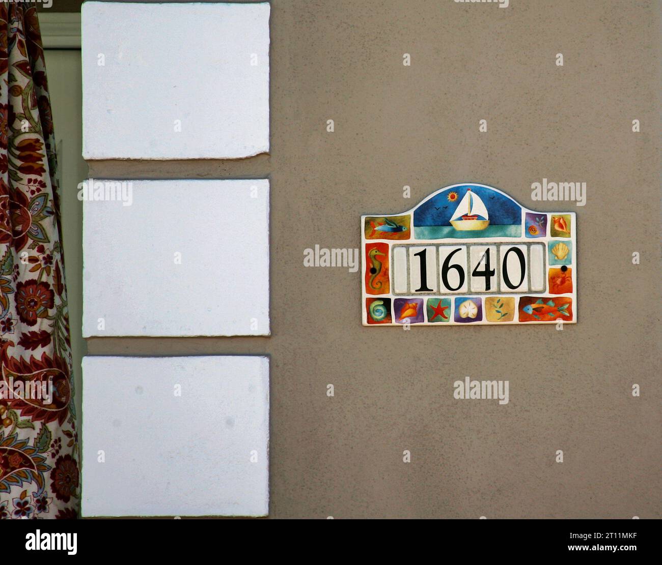 Some Detailed artistic house numbers Stock Photo - Alamy