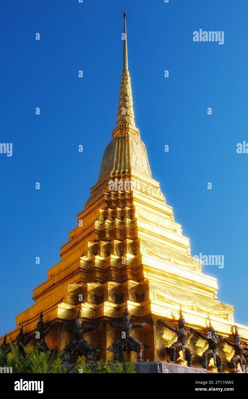 A gilded shrine with a lofty, slender pinnacle and numerous levels ...