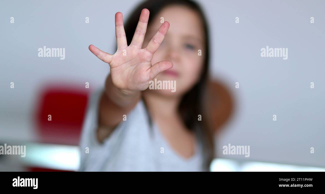 Little girl saying NO with hand. Child gesturing to STOP Stock Photo ...