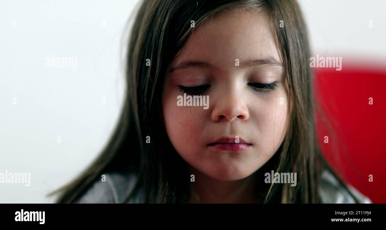Little girl sad face emotion close-up portrait Stock Photo - Alamy