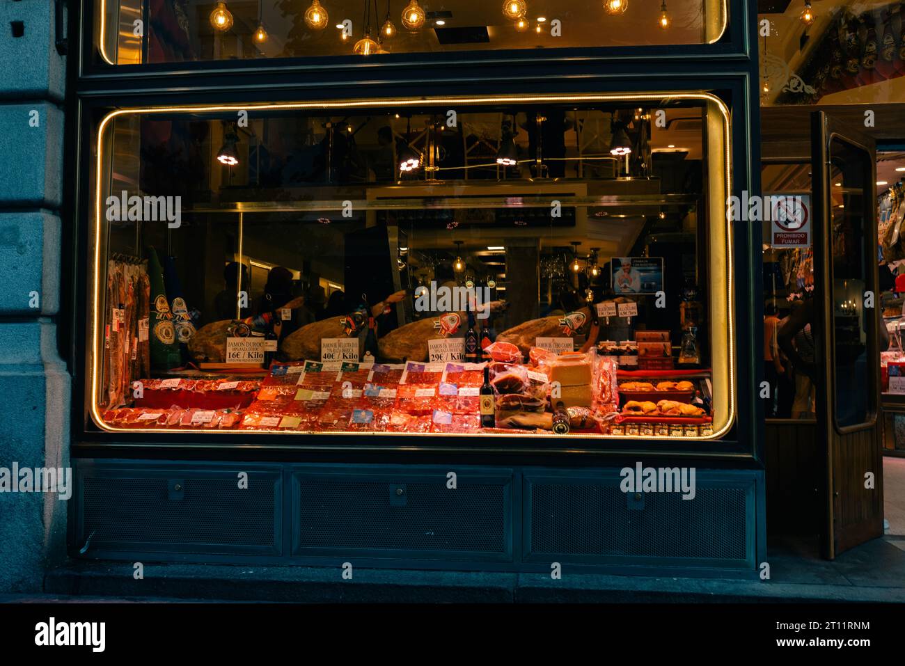 valencia, spain - august 12th 2023 display window of a butcher shop in ...