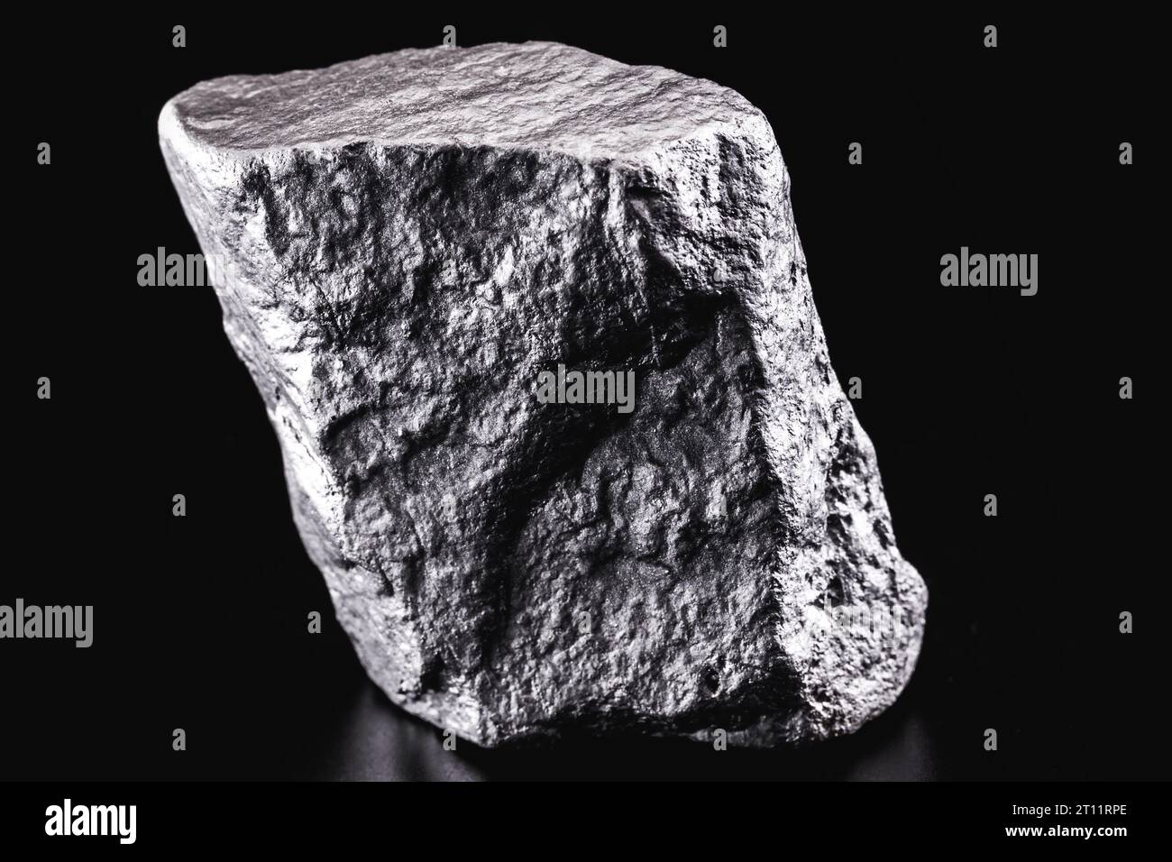silver nugget native to Liberia isolated on black background Stock ...