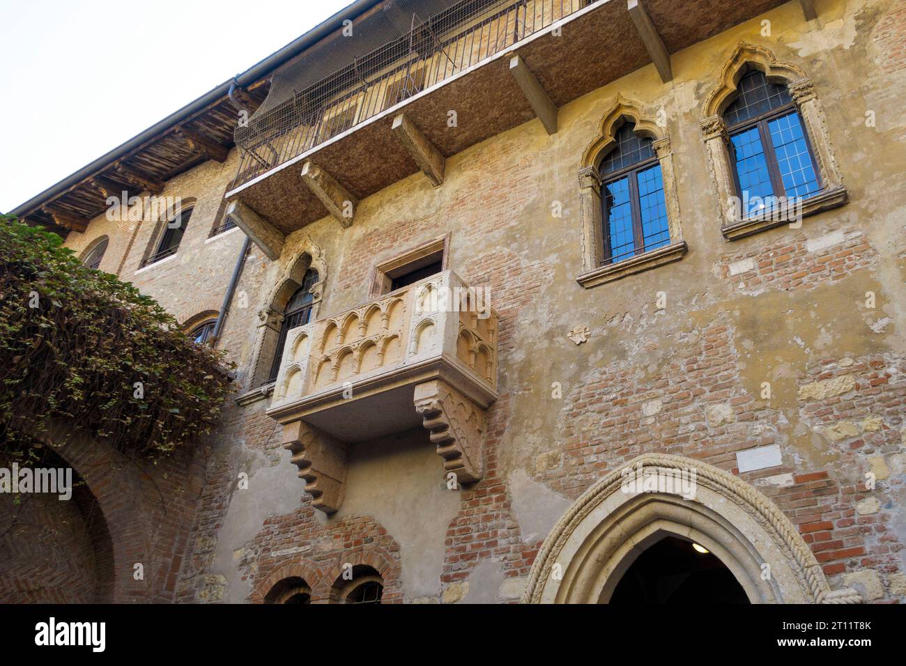 Historic building with famous balcony in Verona, Italy, known for its connection to Shakespeare ...