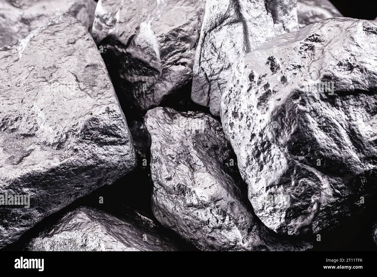 Raw manganese. Manganese stone isolated on black background. Mineral ...