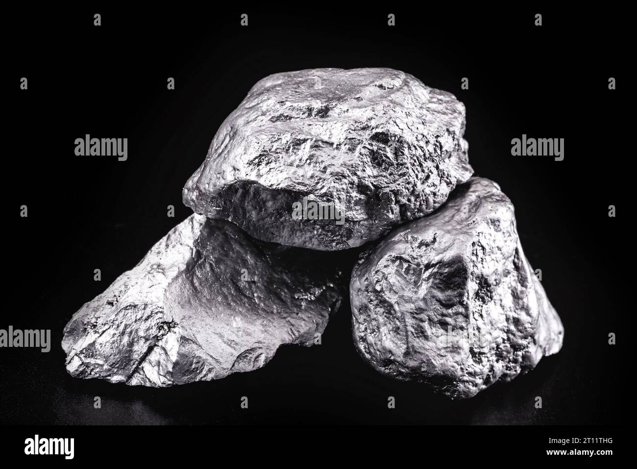 large silver stone, rare silver nugget on black background. Gemstone in ...