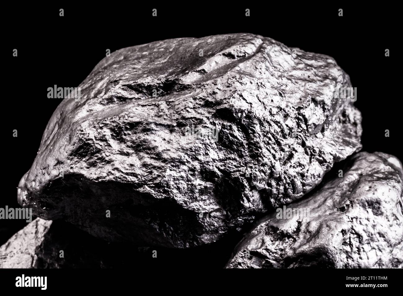 large silver stone, rare silver nugget on black background. Gemstone in ...