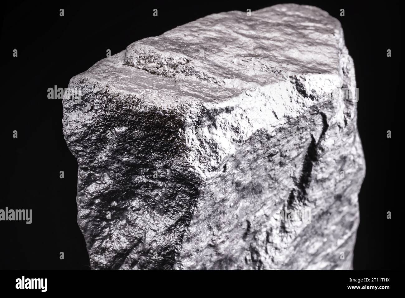 Raw manganese. Manganese stone isolated on black background. Mineral ...