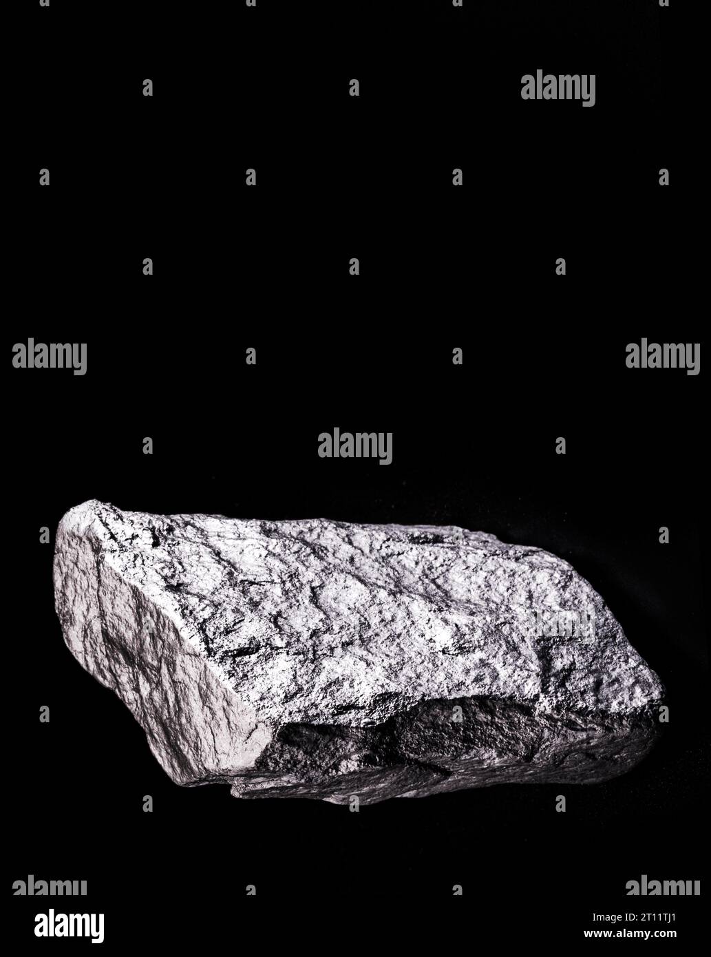 Raw manganese. Manganese stone isolated on black background. Mineral ...