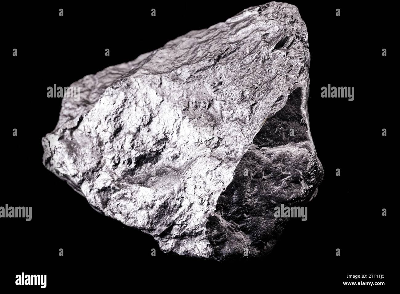 Raw manganese. Manganese stone isolated on black background. Mineral ...