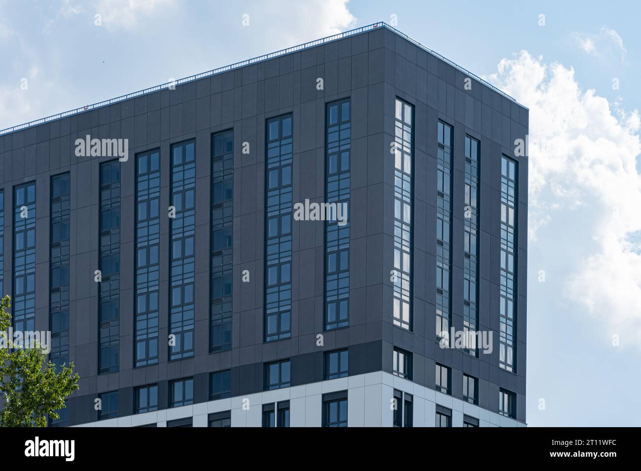 New building facade in housing complex. Modern style in architecture ...