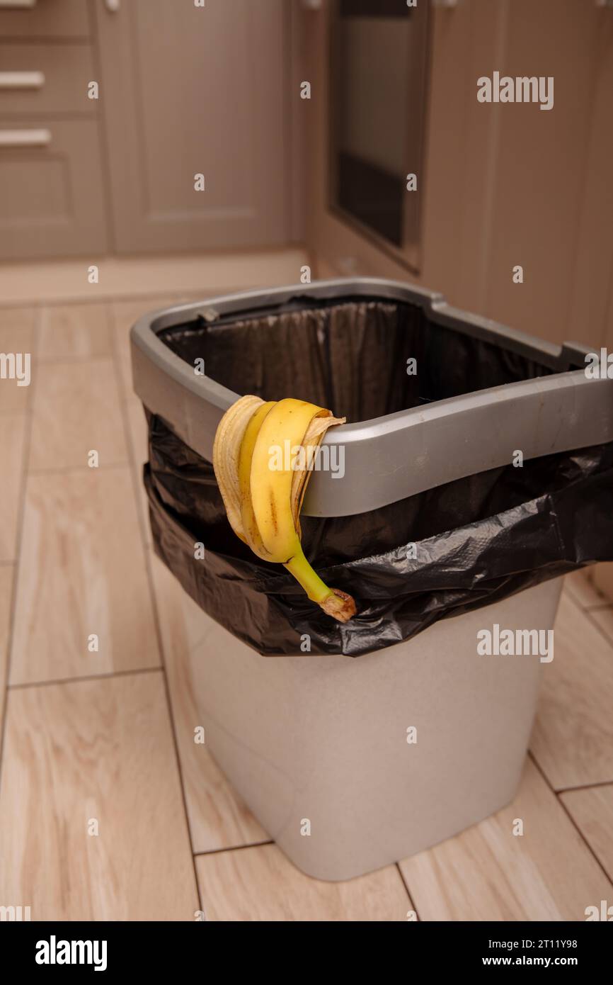 banana peel in a trash bin Stock Photo - Alamy