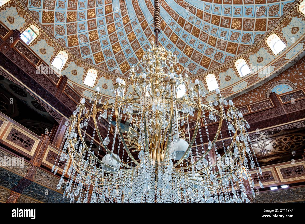Golden chandelier in muslims mosque used to light and decorate the ...