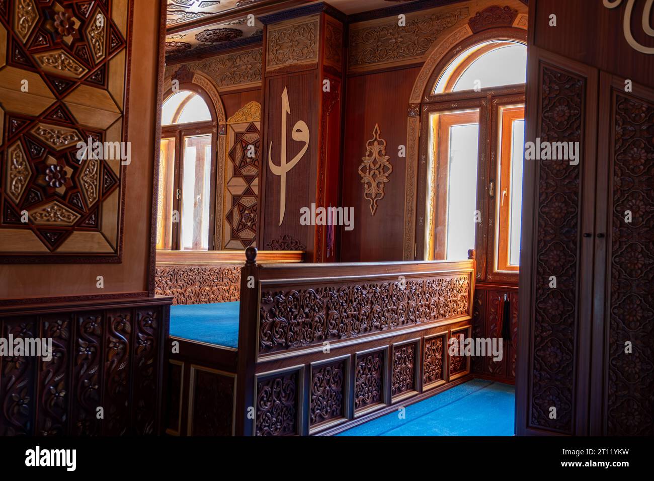 masjid interior design made of wood with blue carpet Stock Photo - Alamy