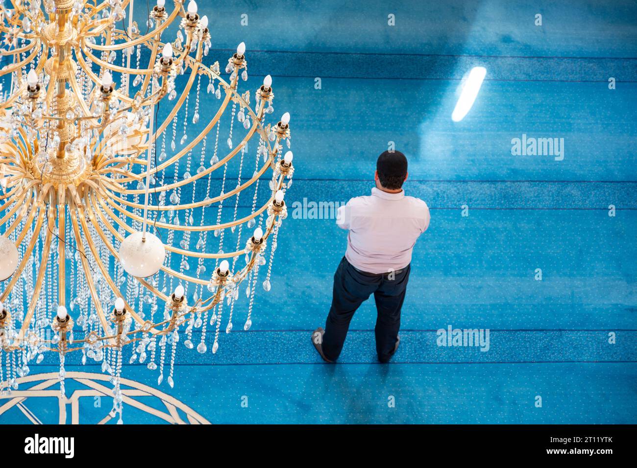 Top view for adult praying in masjid with standing position in pray ...