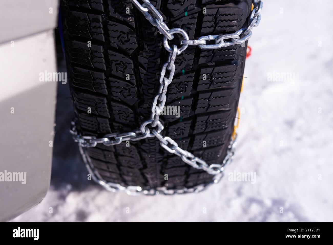 snow chain on a wheel in deep snow in winter road Stock Photo - Alamy