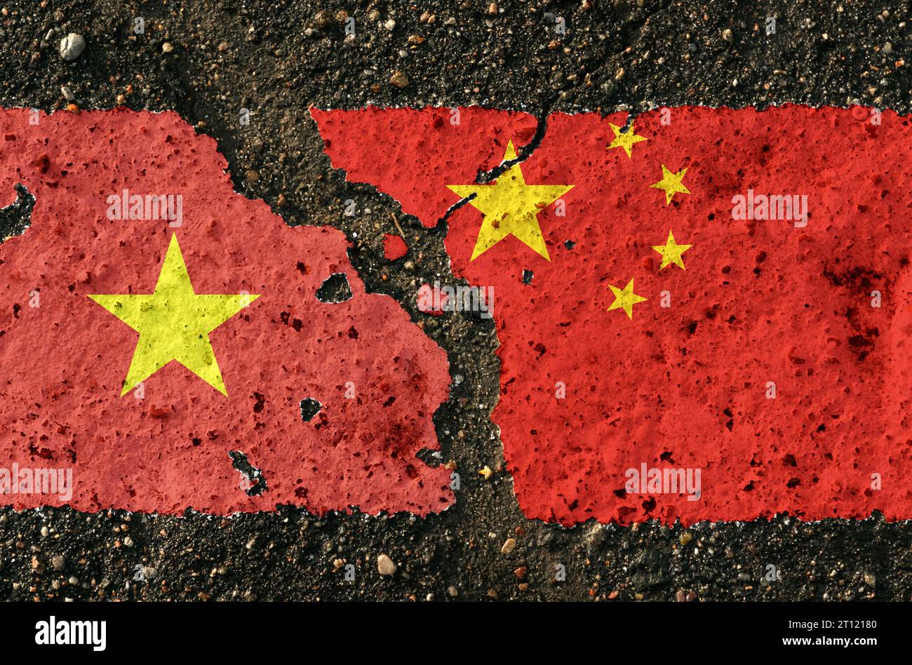 On the pavement are images of the flags of Vietnam and China, as a ...