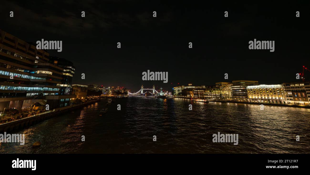 London, UK: Night view over the River Thames taken from London Bridge ...
