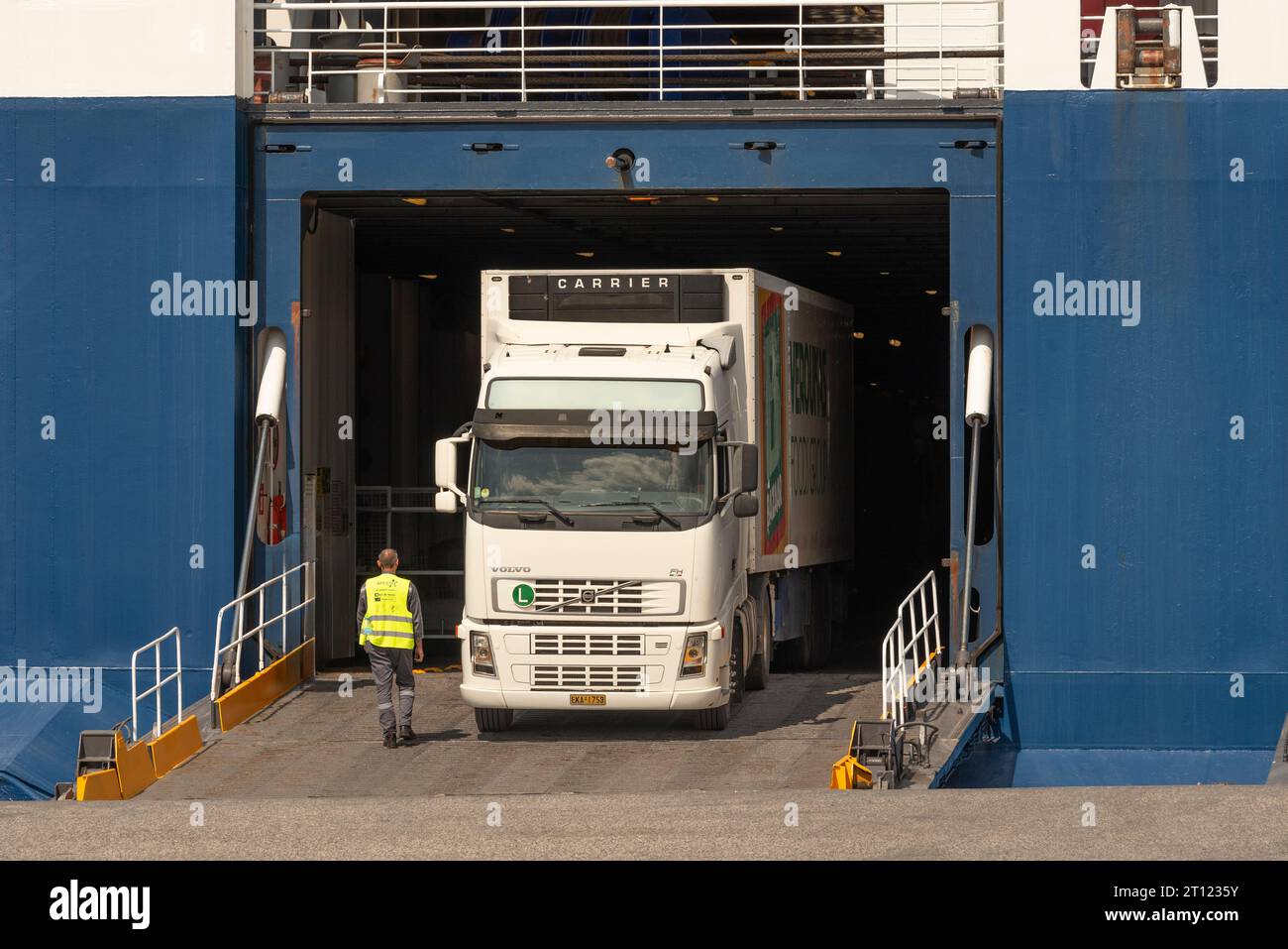 Heraklion, Crete, Greece. 26 Sept. 2023. Trucks loading and unloading ...
