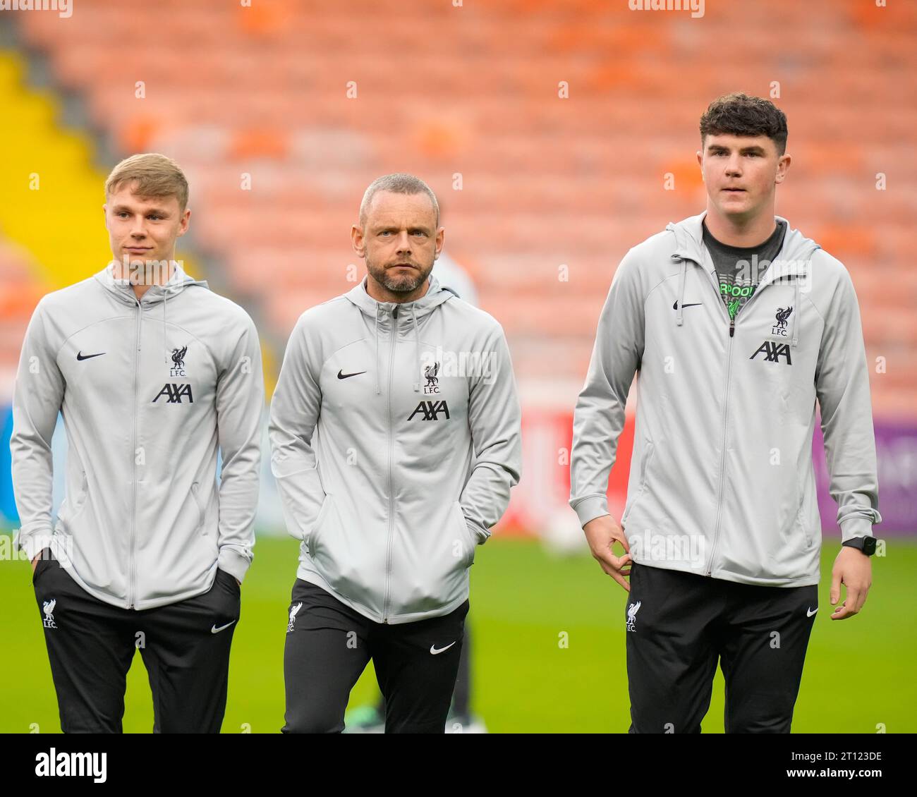 Jay Spearing #71 of Liverpool inspects the pitch with team mates before ...