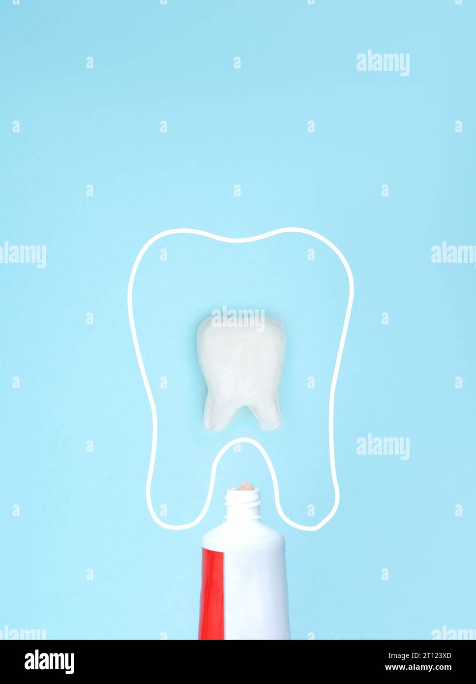 Small Red Toothpaste Tube with open lid, white molar tooth model and ...