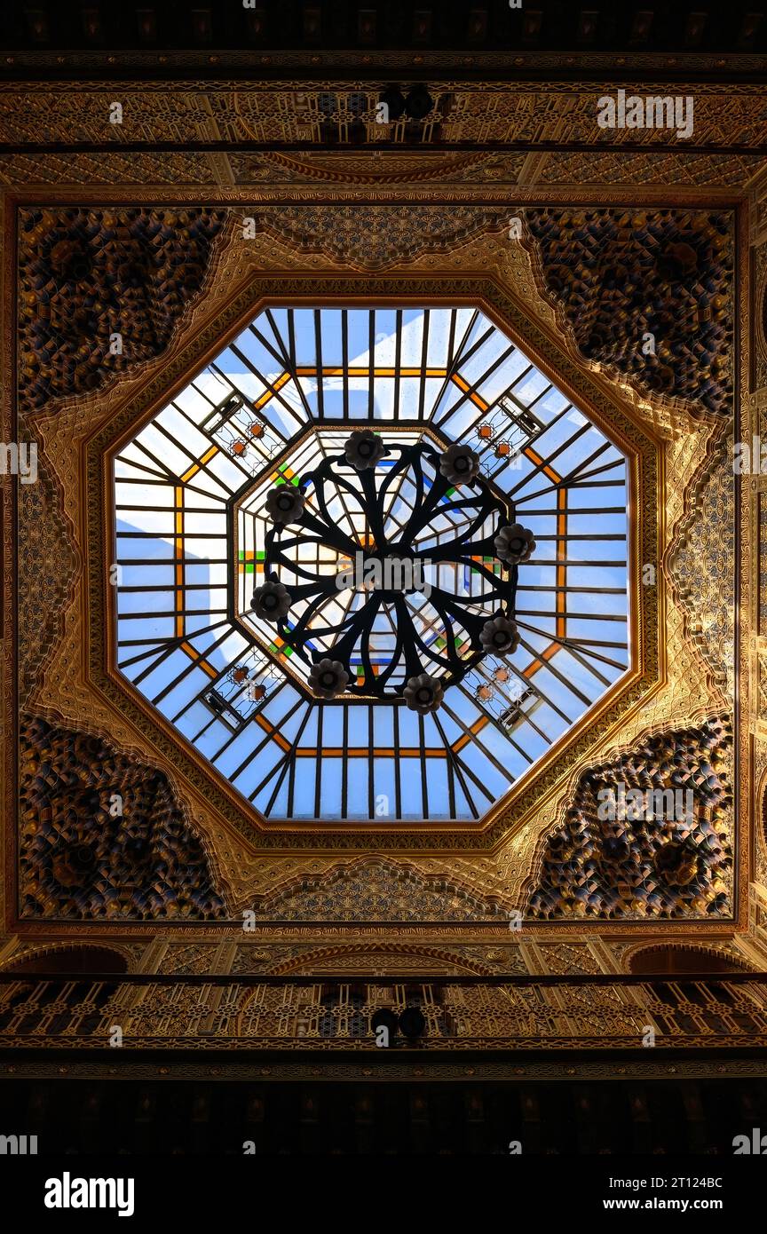 Beautiful glass skylight dome or cupola in the ceiling of the historical building. Low-angle ...
