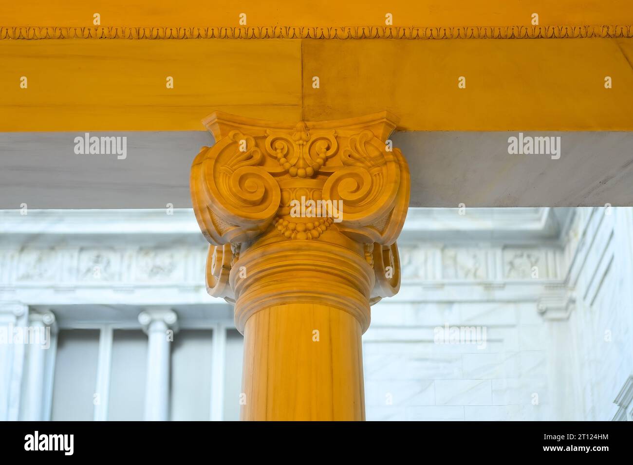 The architectural feature of a column capital supporting the porch ...