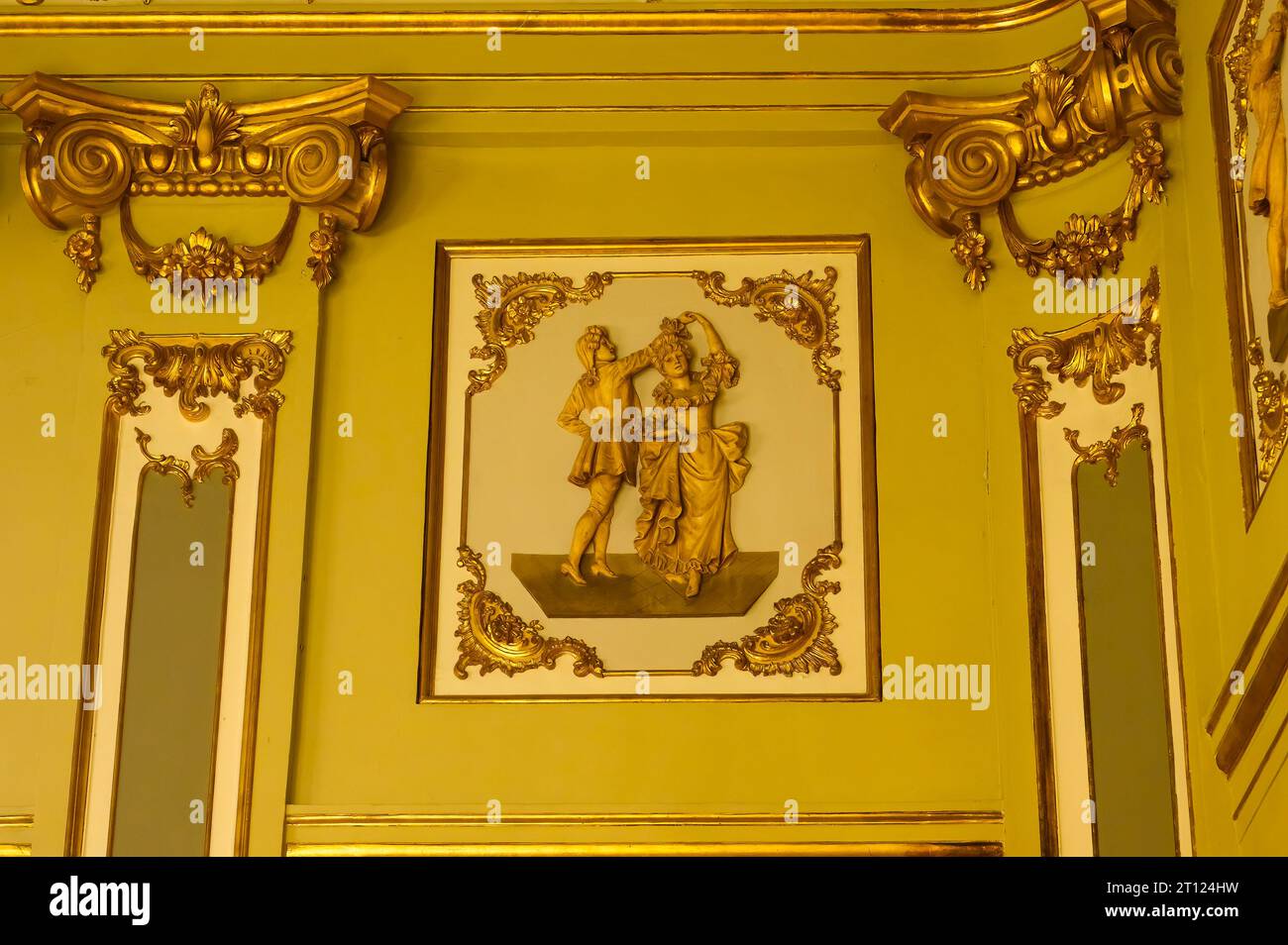 Ornamental art of people dancing. Gold-colored luxurious decorations in ...