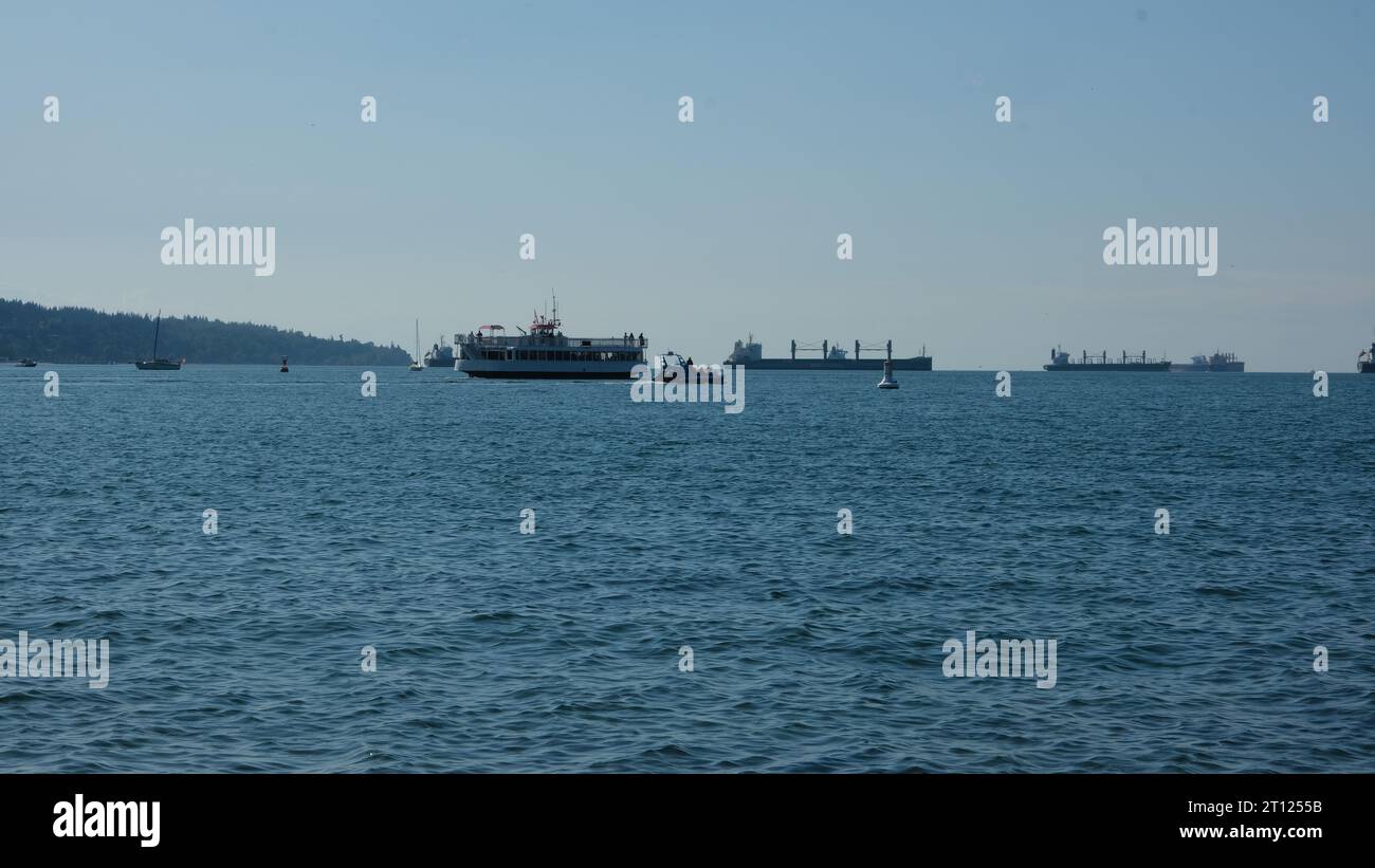 Sea view with boats, yachts, tankers. Beautiful ocean harbour with blue ...