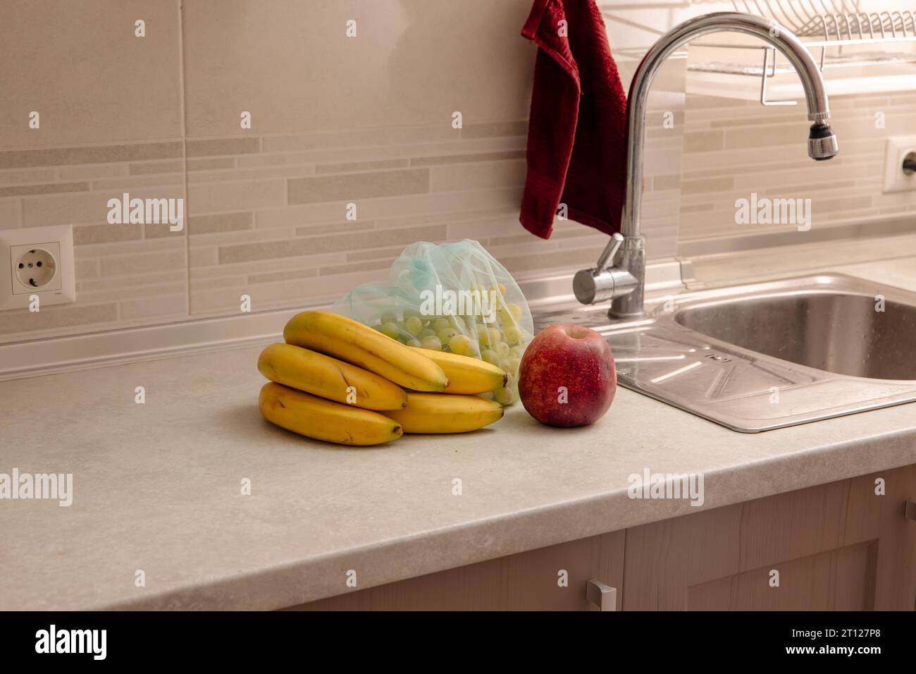 Kitchen Scene with Bananas and Mixed Fruits Stock Photo - Alamy