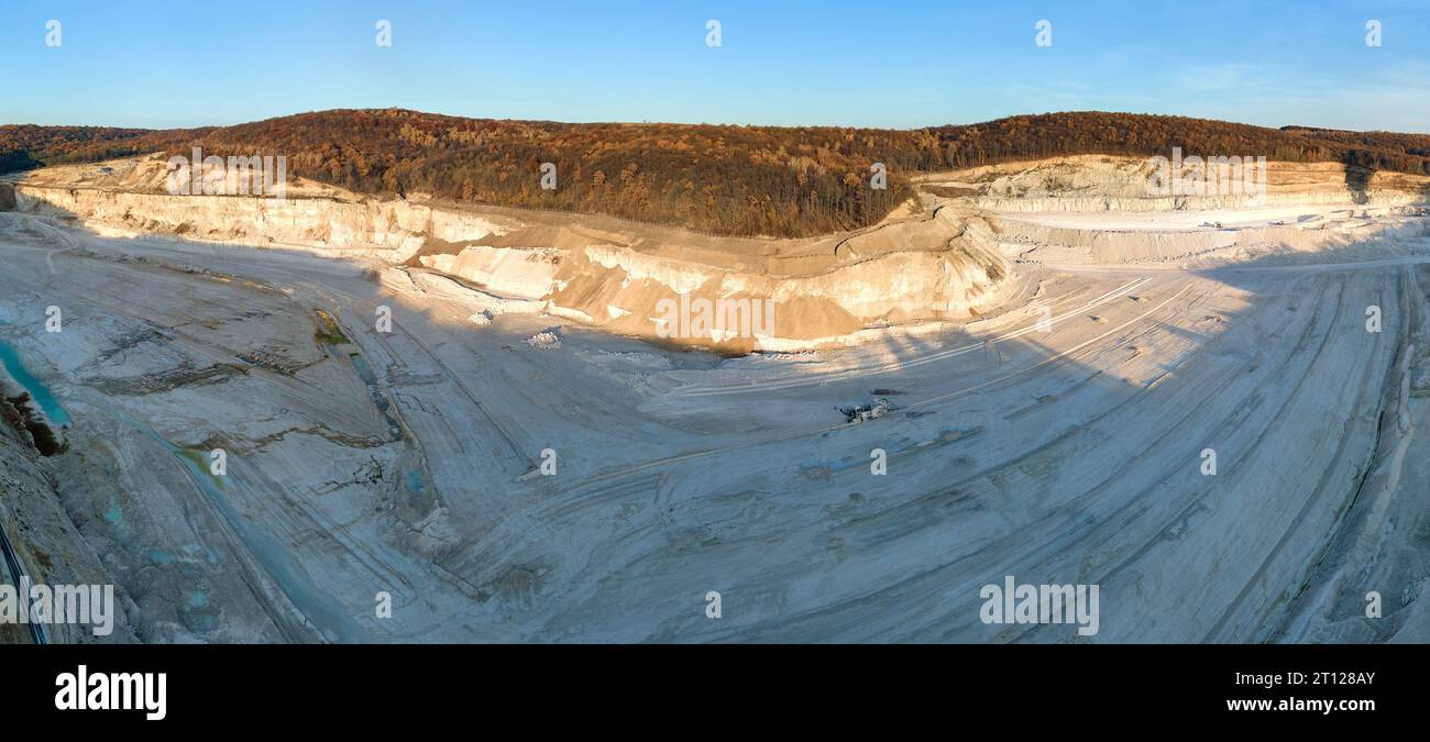 Aerial view of open pit mining site of limestone materials for ...