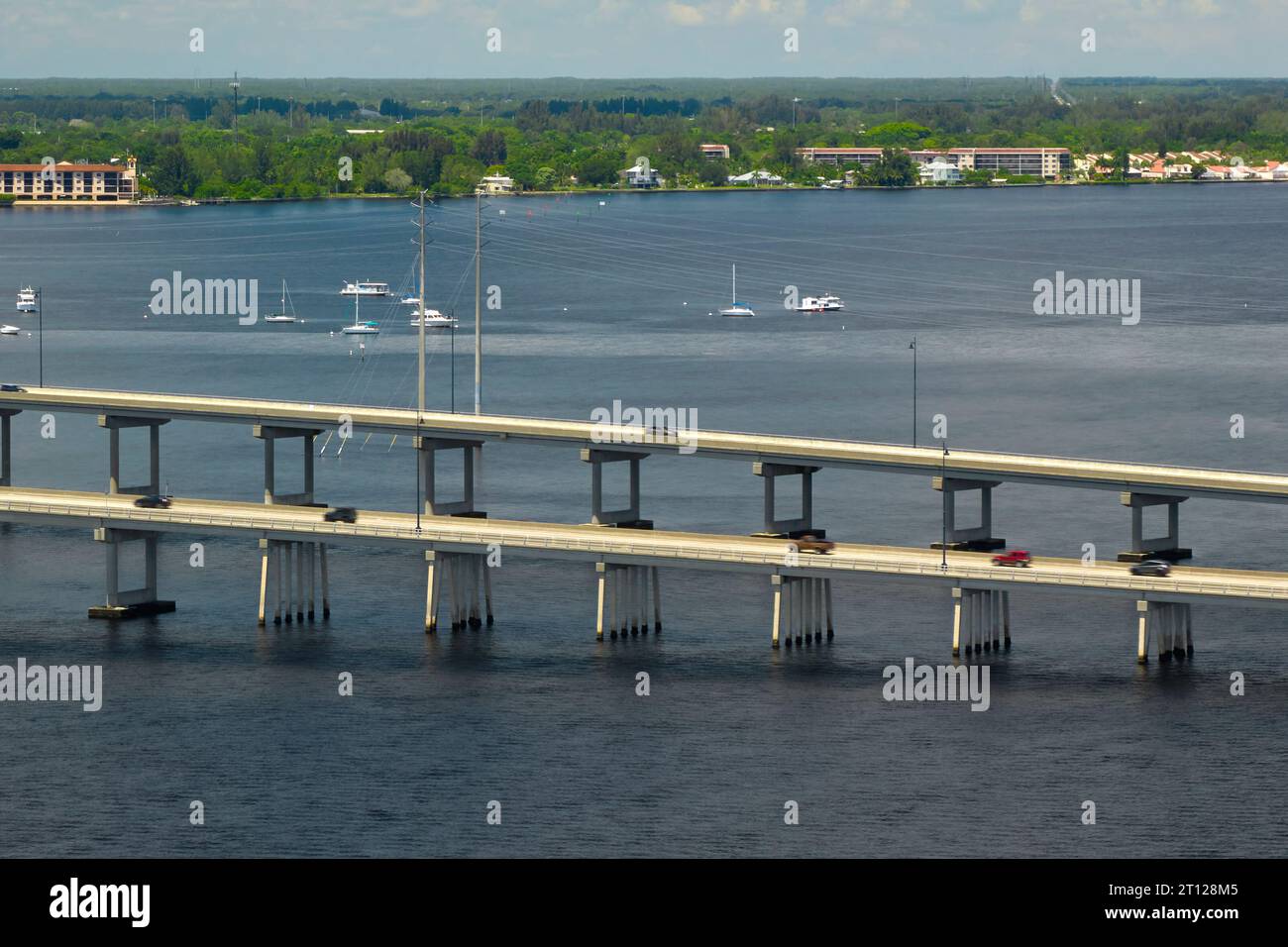 Barron Collier Bridge and Gilchrist Bridge in Florida with moving ...