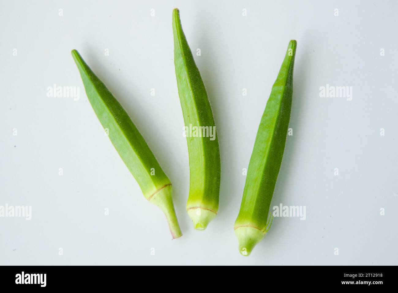 Close up of fresh okra isolated on white background. Fresh green okra ...