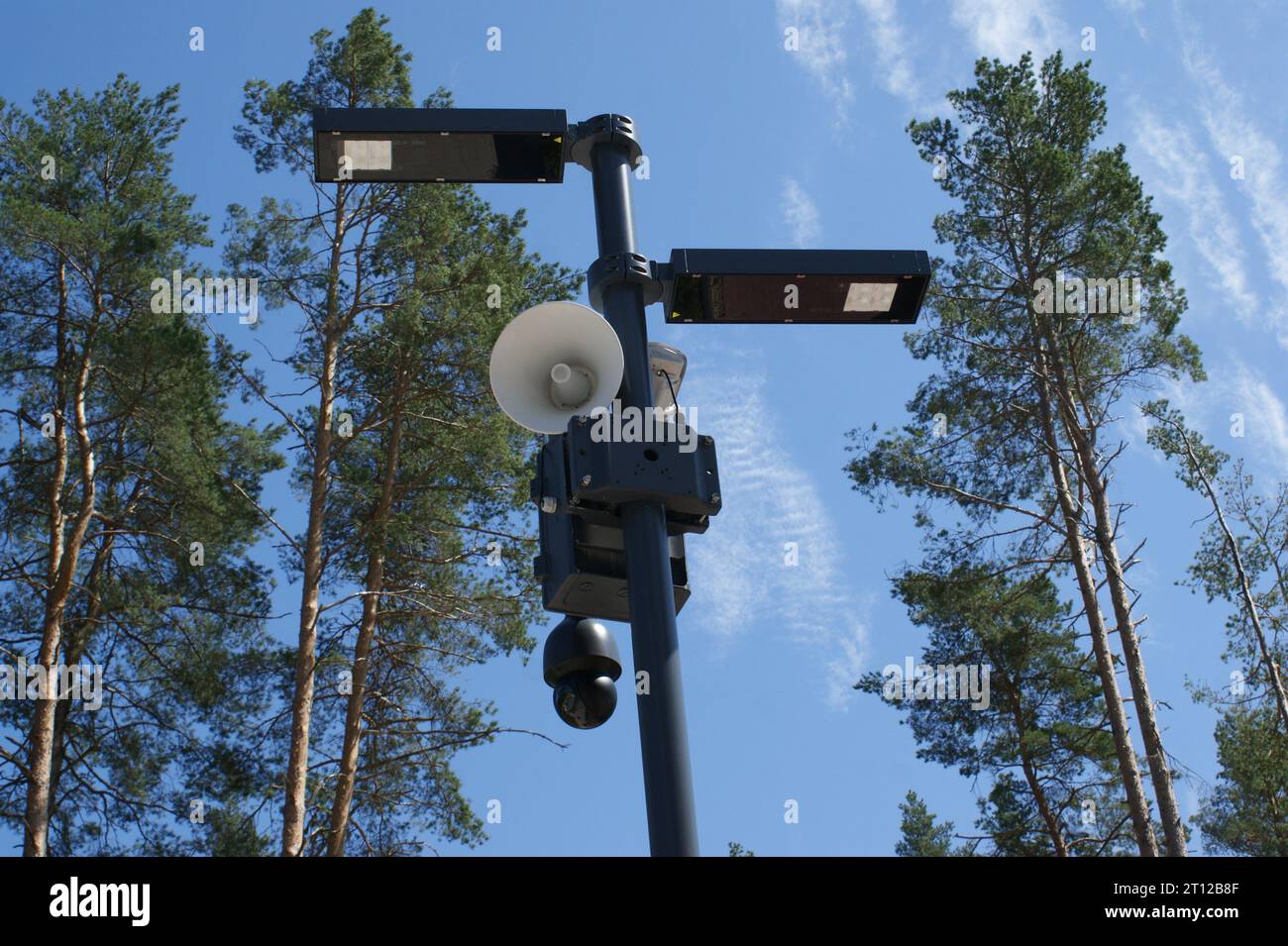 Surveillance cameras and a speaker on a modern lantern. Security ...