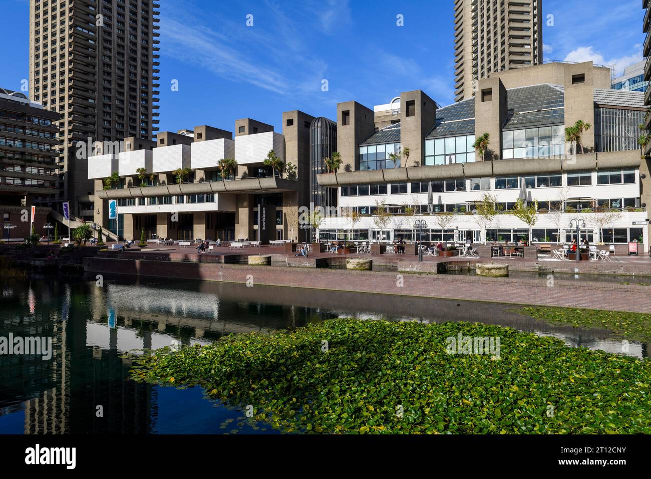 A view across the lake in front of the Barbican Centre, with the ...