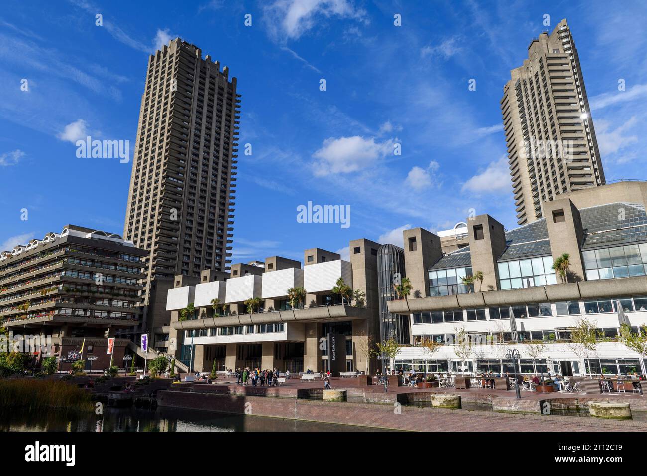 A view across the lake in front of the Barbican Centre, the apartment ...