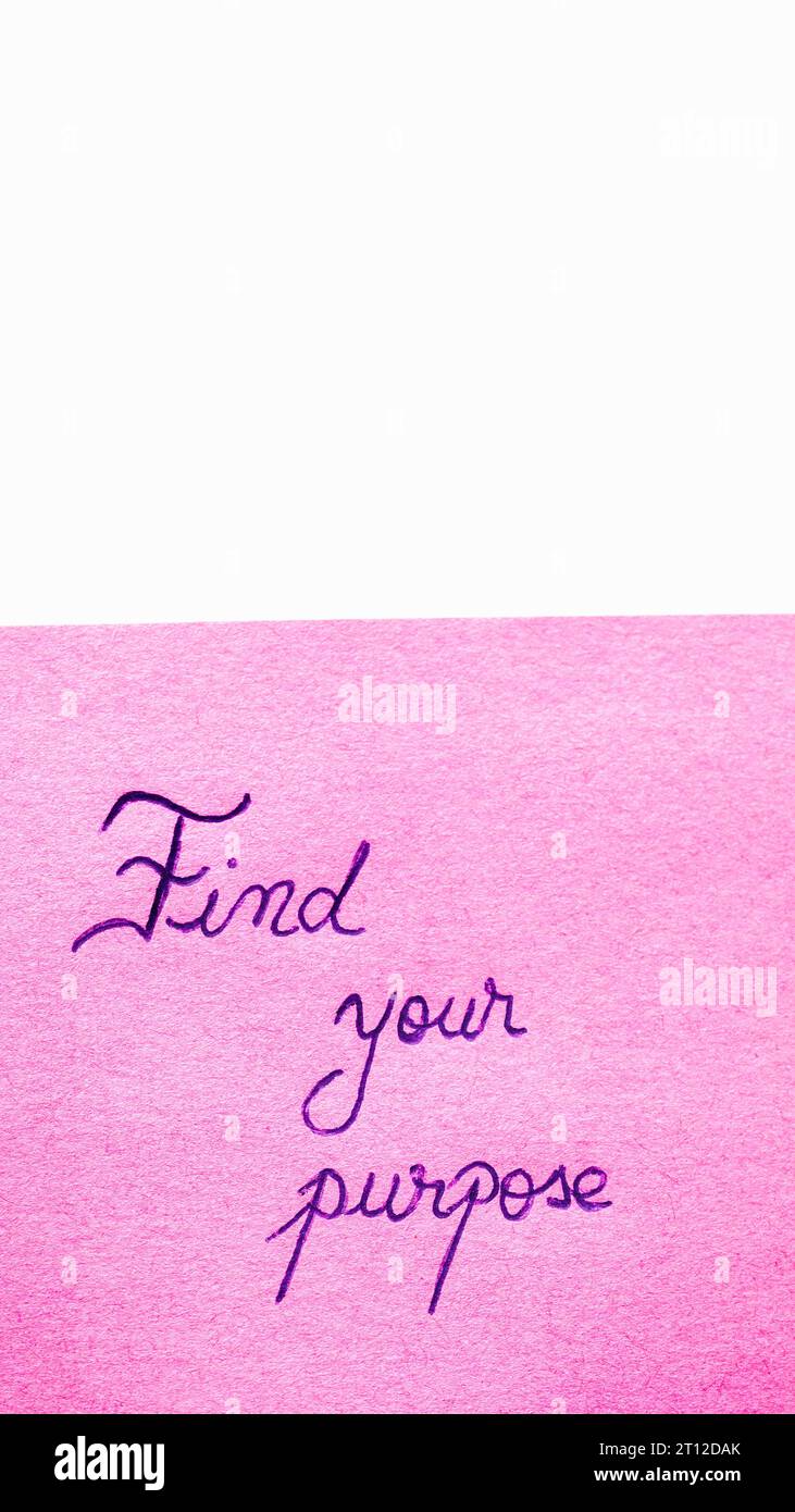 Find your purpose handwriting text close up isolated on pink paper with ...