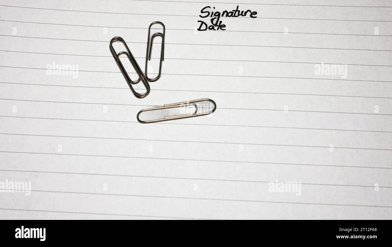 Signature and date, handwriting text on page of office agenda, office ...