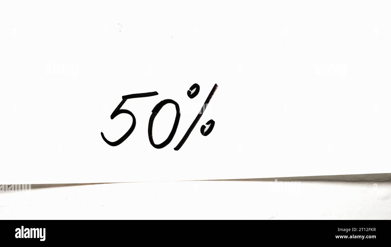 Writing 50 percent on white label on white background Stock Photo - Alamy