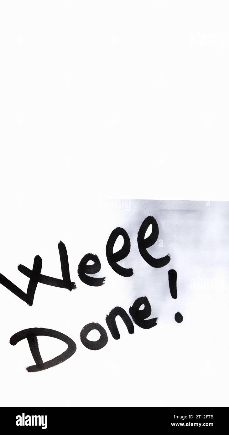 Well done handwriting text close up isolated on white paper with copy ...