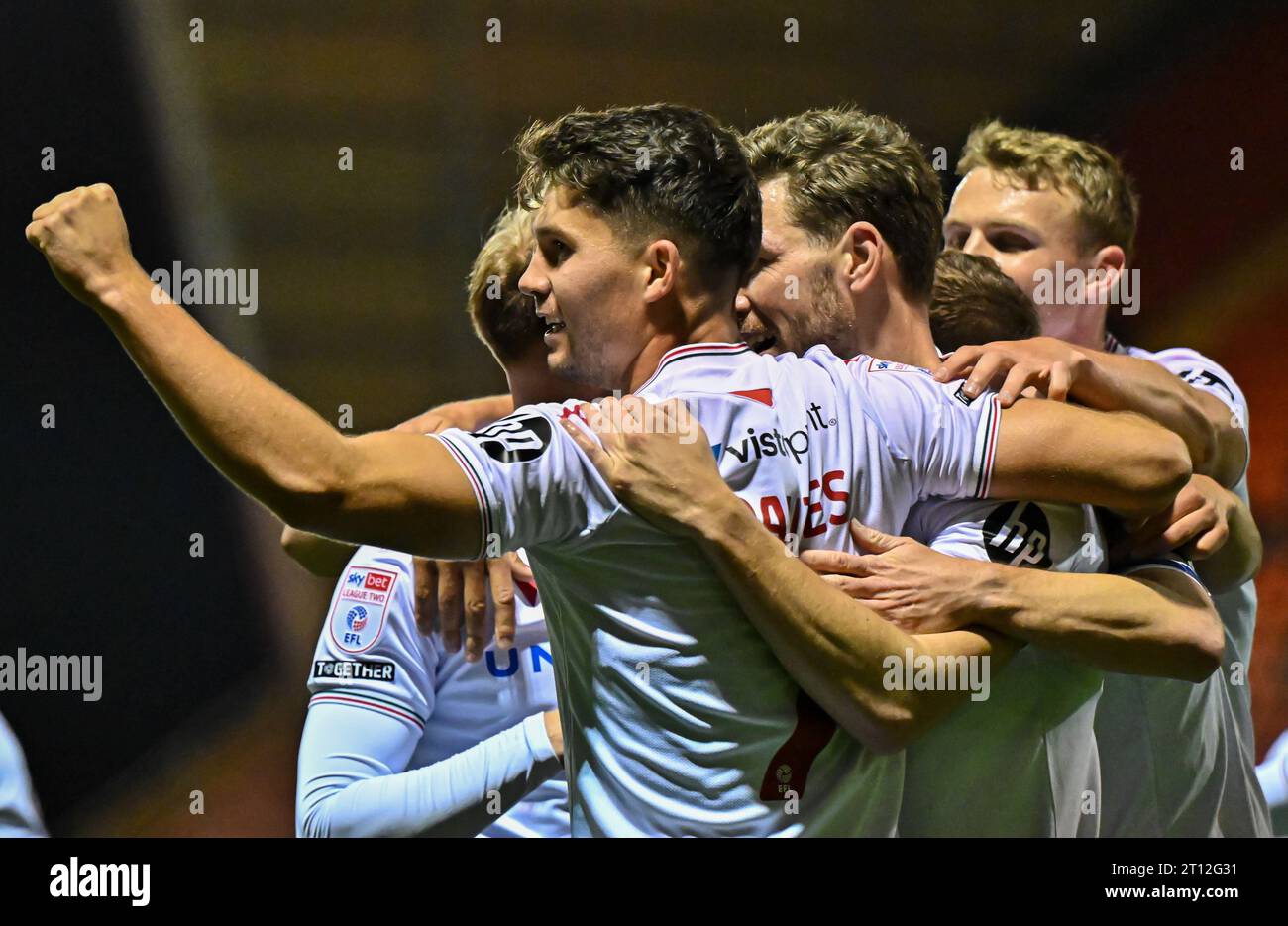 Crewe, UK. 10th Oct, 2023. Wrexham celebrates Jordan Tunnicliffe 6# of ...