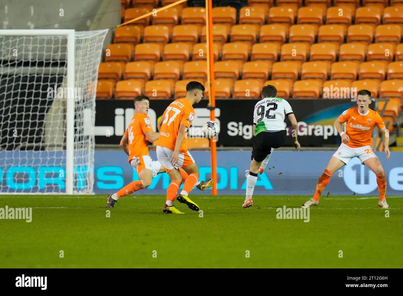 Mateusz Musialowski #92 of Liverpool drives a shot at the Blackpool ...