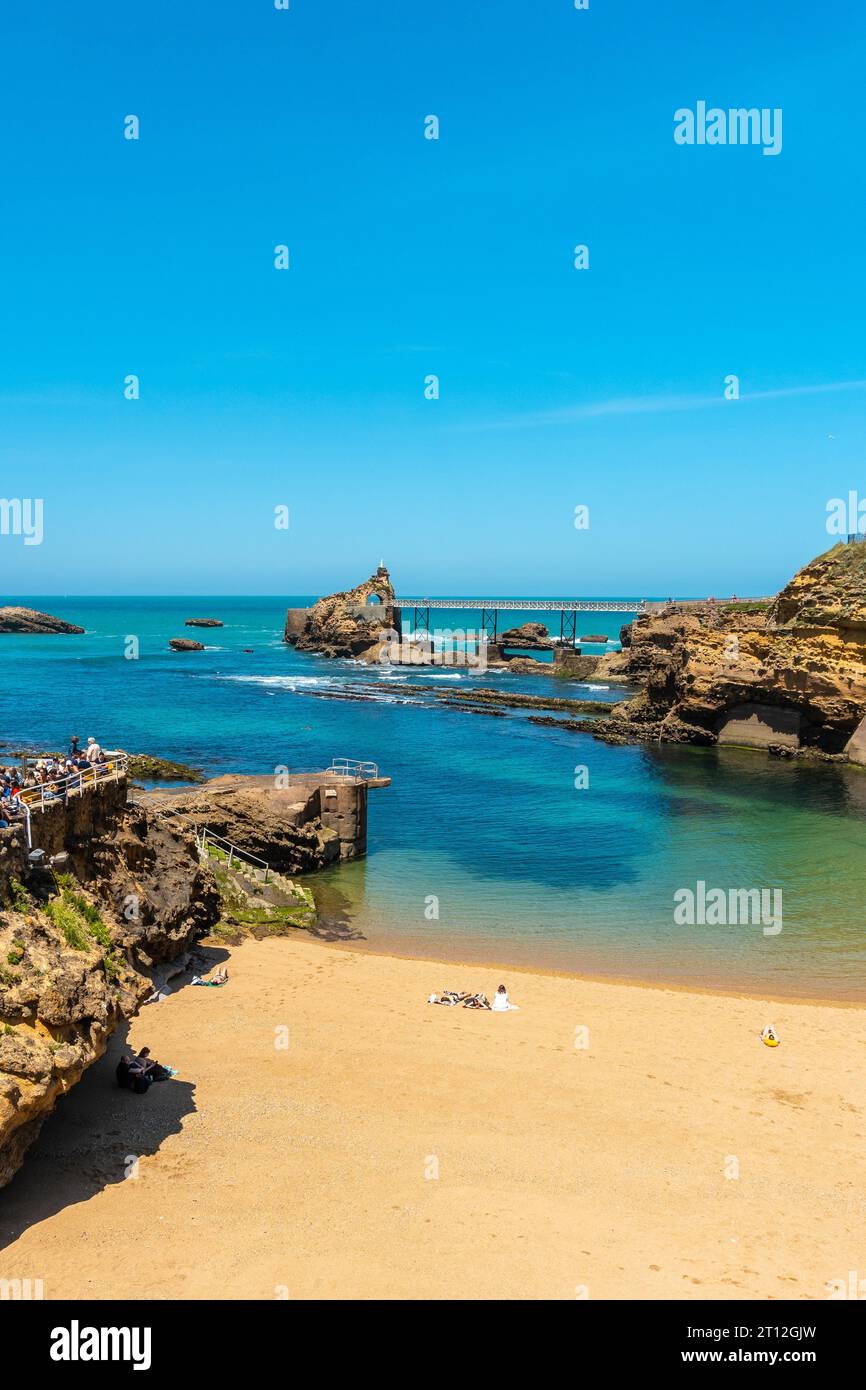 The beautiful Plage du Port Vieux on a summer afternoon where bathers ...
